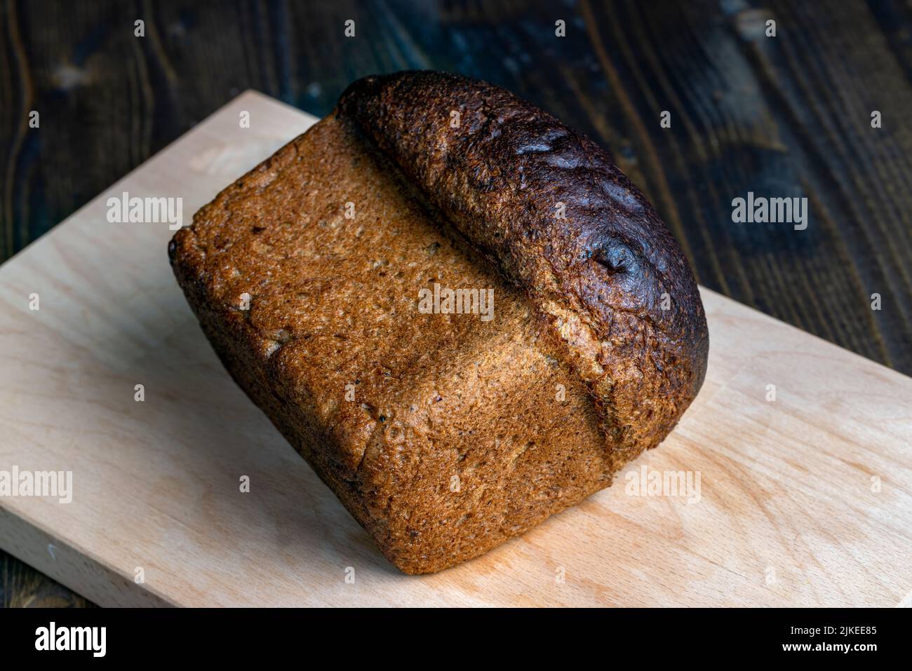 Rectangular loaf of rye flour bread, black sour bread made from rye ...