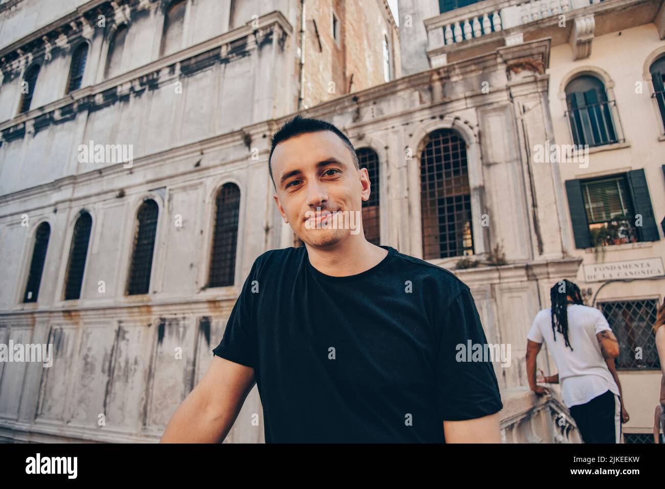 Man in Venice. Tourist on a trip to Italy Stock Photo - Alamy
