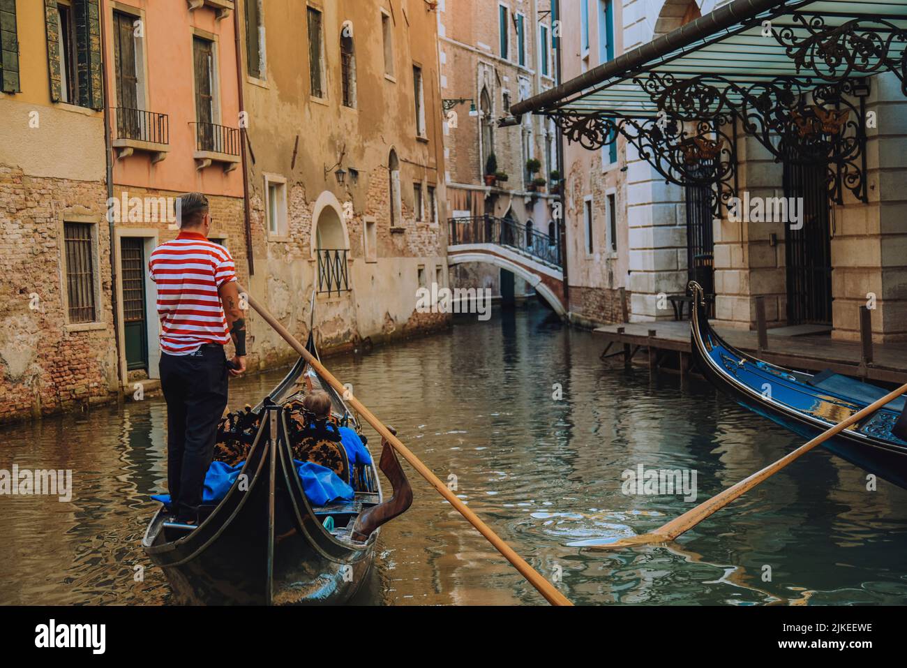 Venice Grand Canal. People float on gondolas, gondoliers. View of the ...