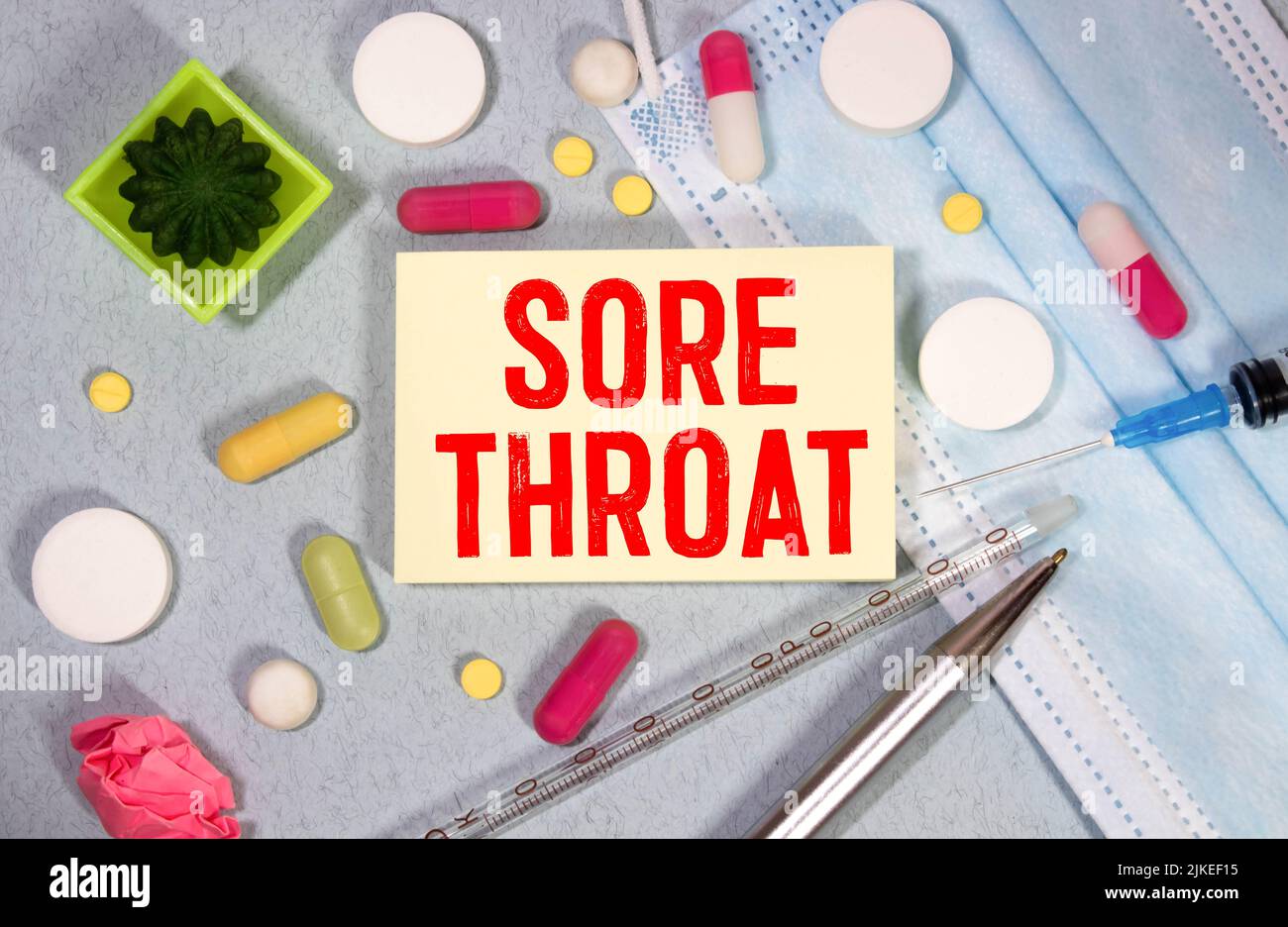 Sore throat inscription. Medical text or words Stock Photo - Alamy