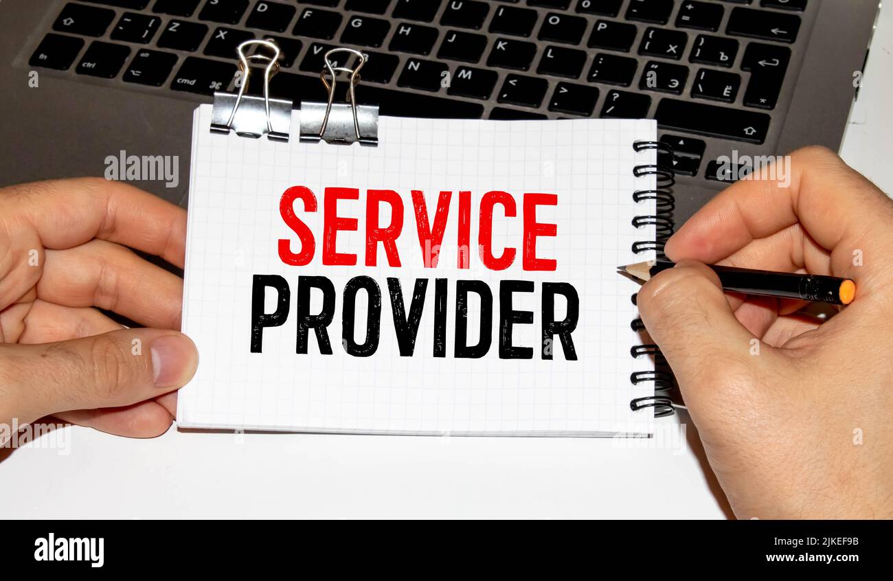 Closeup on business woman hand holding a card with SERVICE PROVIDER ...