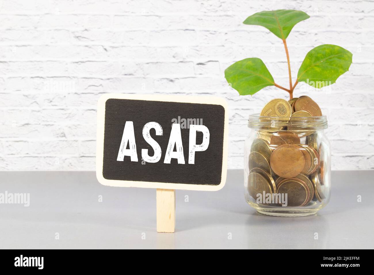 The word asap laid with silver metal letters in center of painted ...