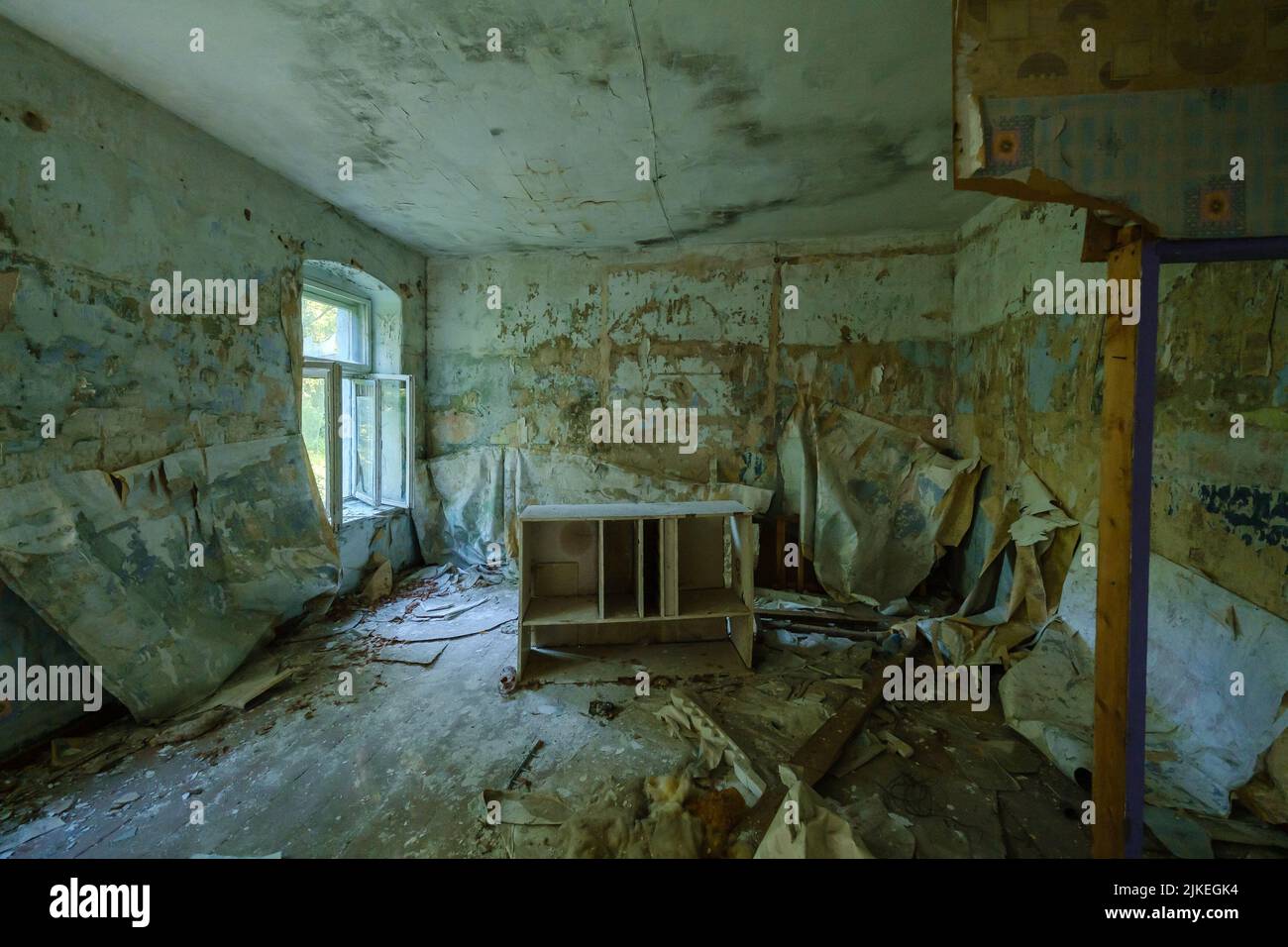 Interior of derelict room with garbage Stock Photo - Alamy