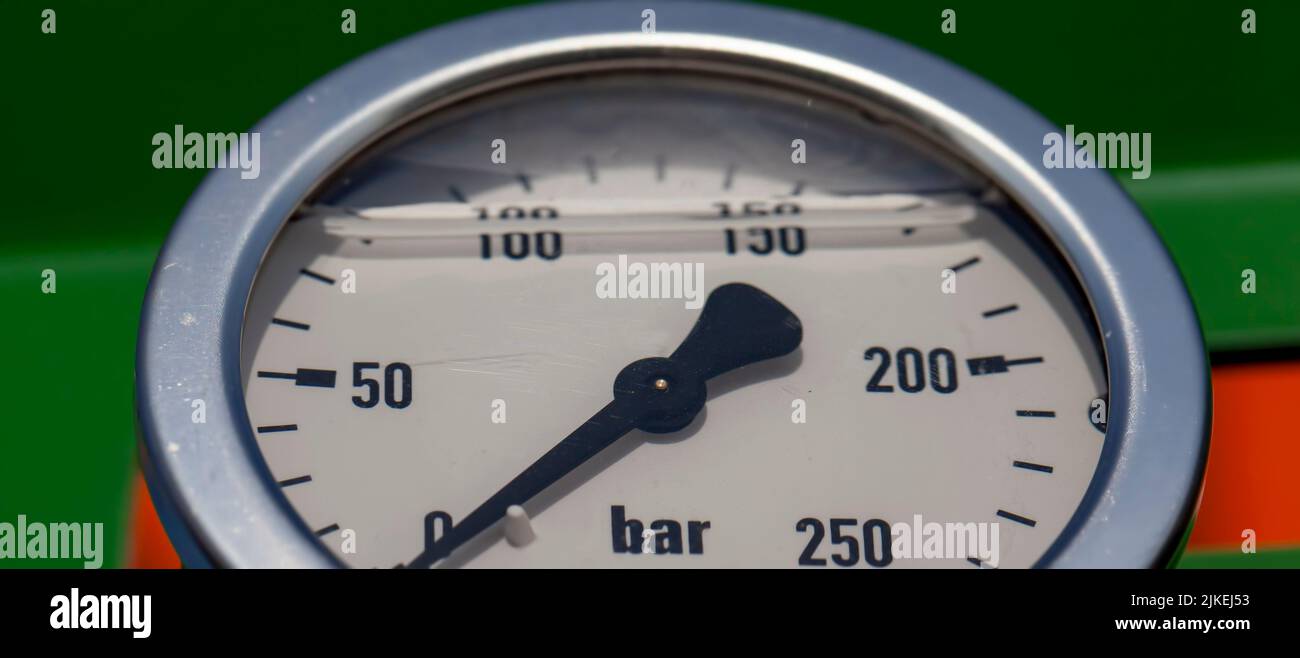 Equipment showing the pressure in bar, part of the screen indicating ...