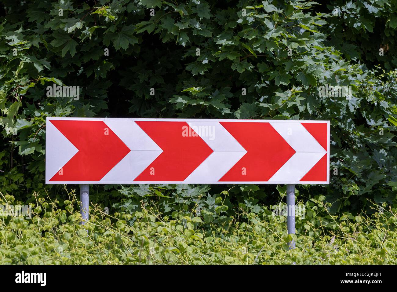 A road sign installed on the road to regulate traffic, a metal sign for ...