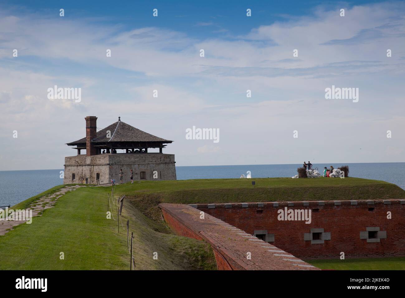 Stone lookout building sits on bluff and overlooks Lake Ontario. Old ...