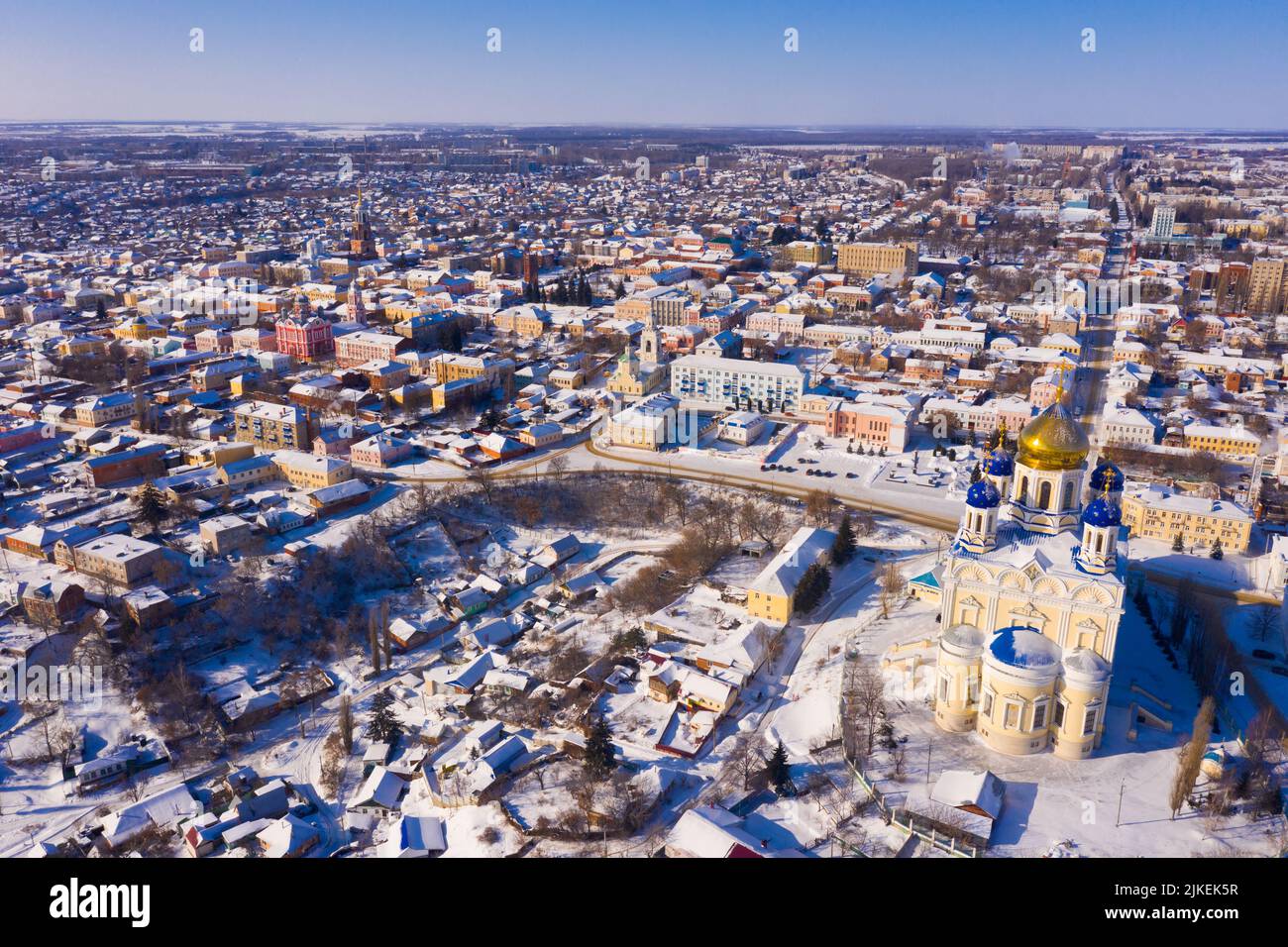 Aerial view of the Ascension Cathedral and residential areas in winter ...