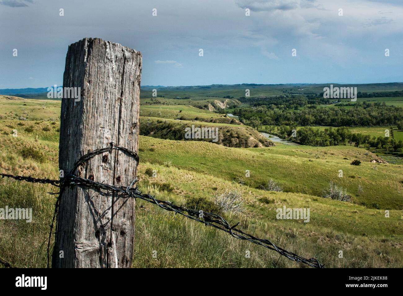Weathered fence post overlooks the Little Bighorn National Monument ...