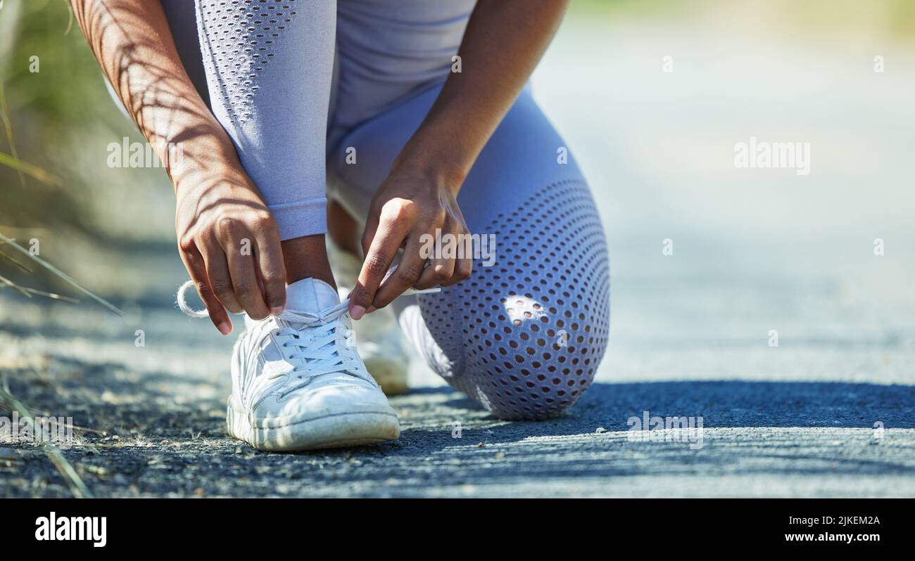 Gearing up to tackle a tough path. Closeup shot of an unrecognisable ...