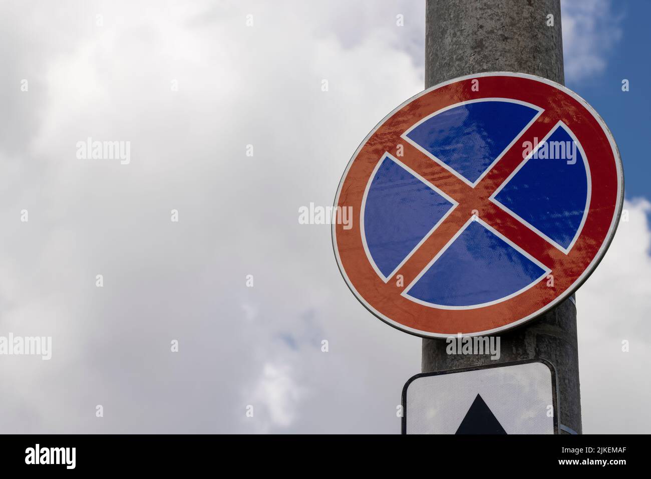 A road sign installed on the road to regulate traffic, a metal sign for ...