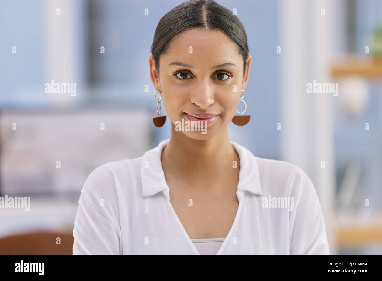 A life without the middleman. Portrait of a businesswoman in a modern ...