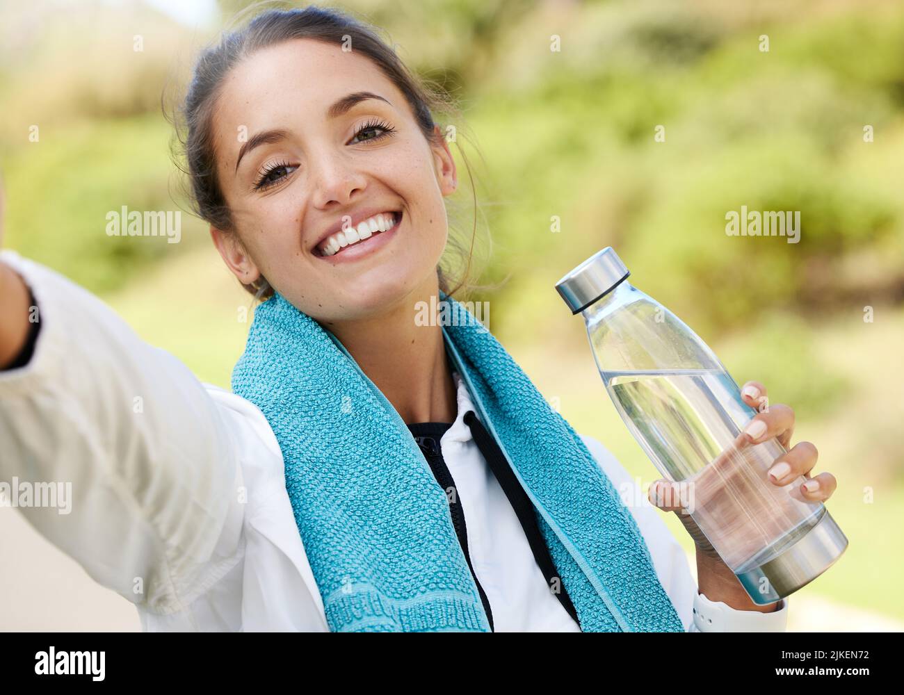 Smile, this workout is good for you. Cropped portrait of an attractive and athletic young woman ...