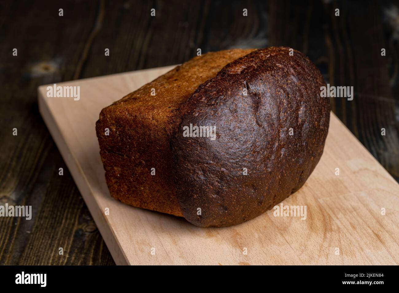 Rectangular loaf of rye flour bread, black sour bread made from rye ...