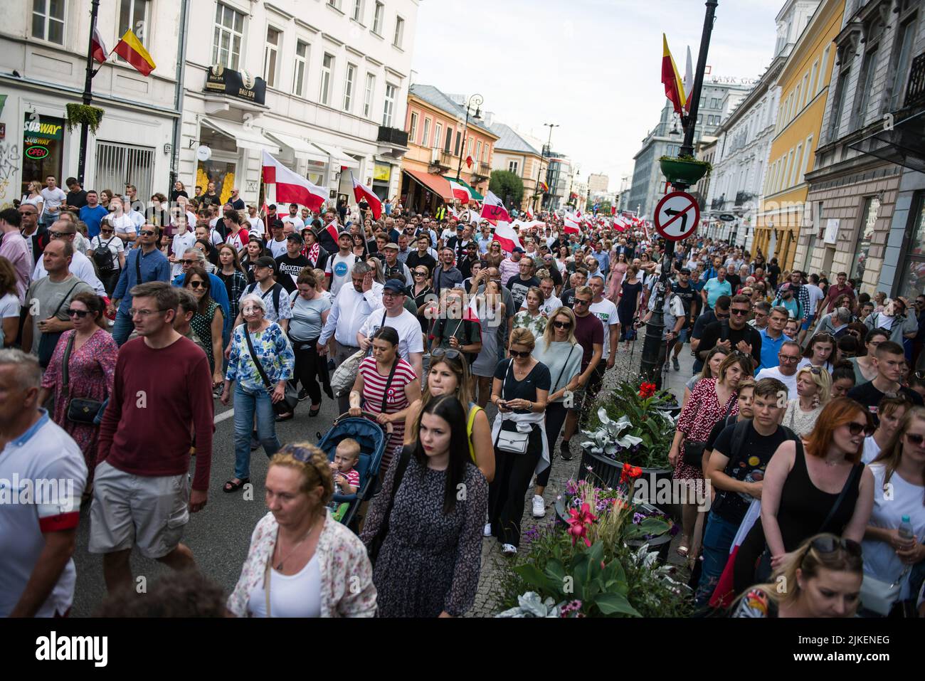 Warsaw, Poland. 01st Aug, 2022. A crowd of people seen marching to ...