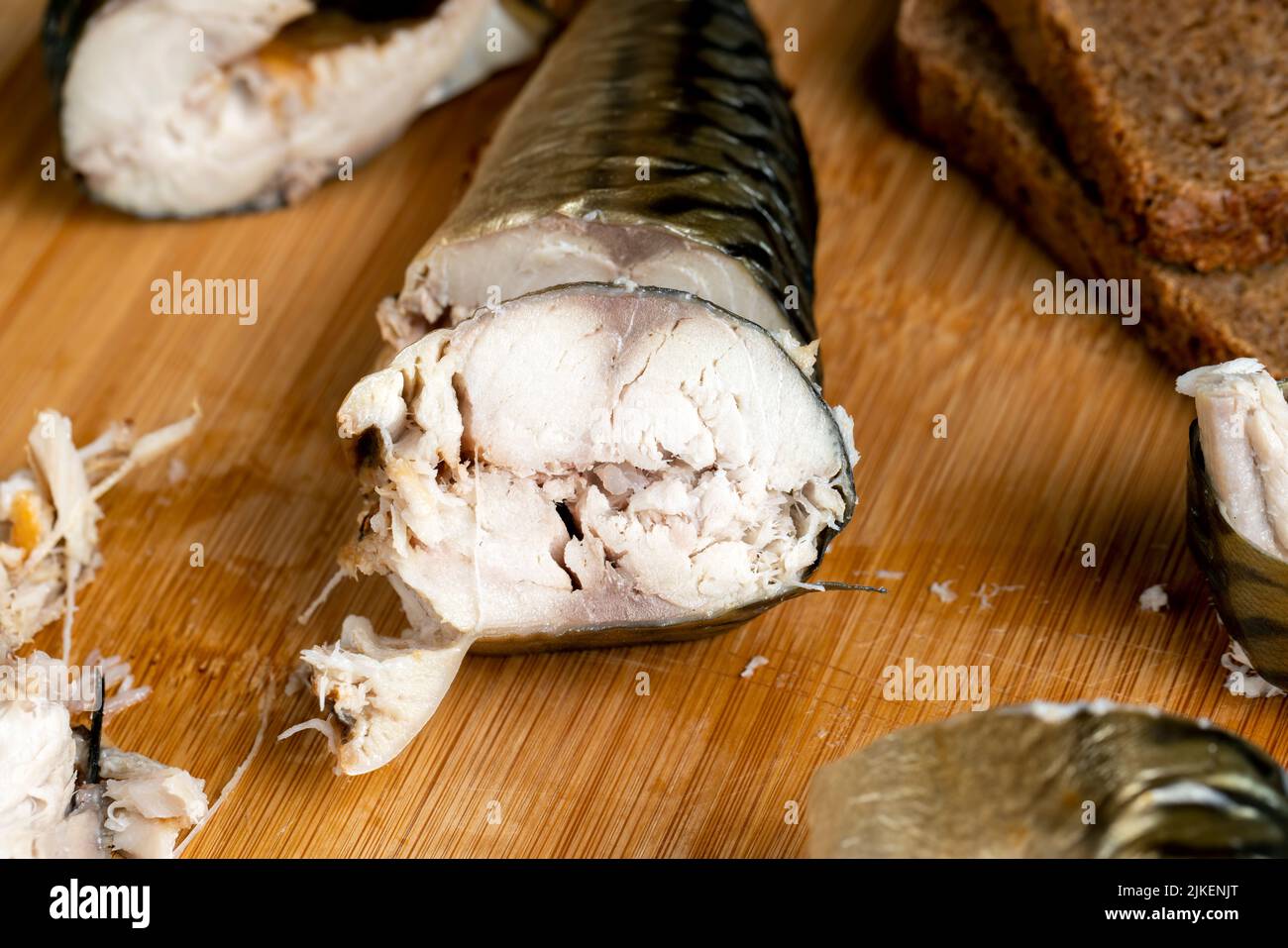 cut into pieces of smoked mackerel during cooking , smoked mackerel ...