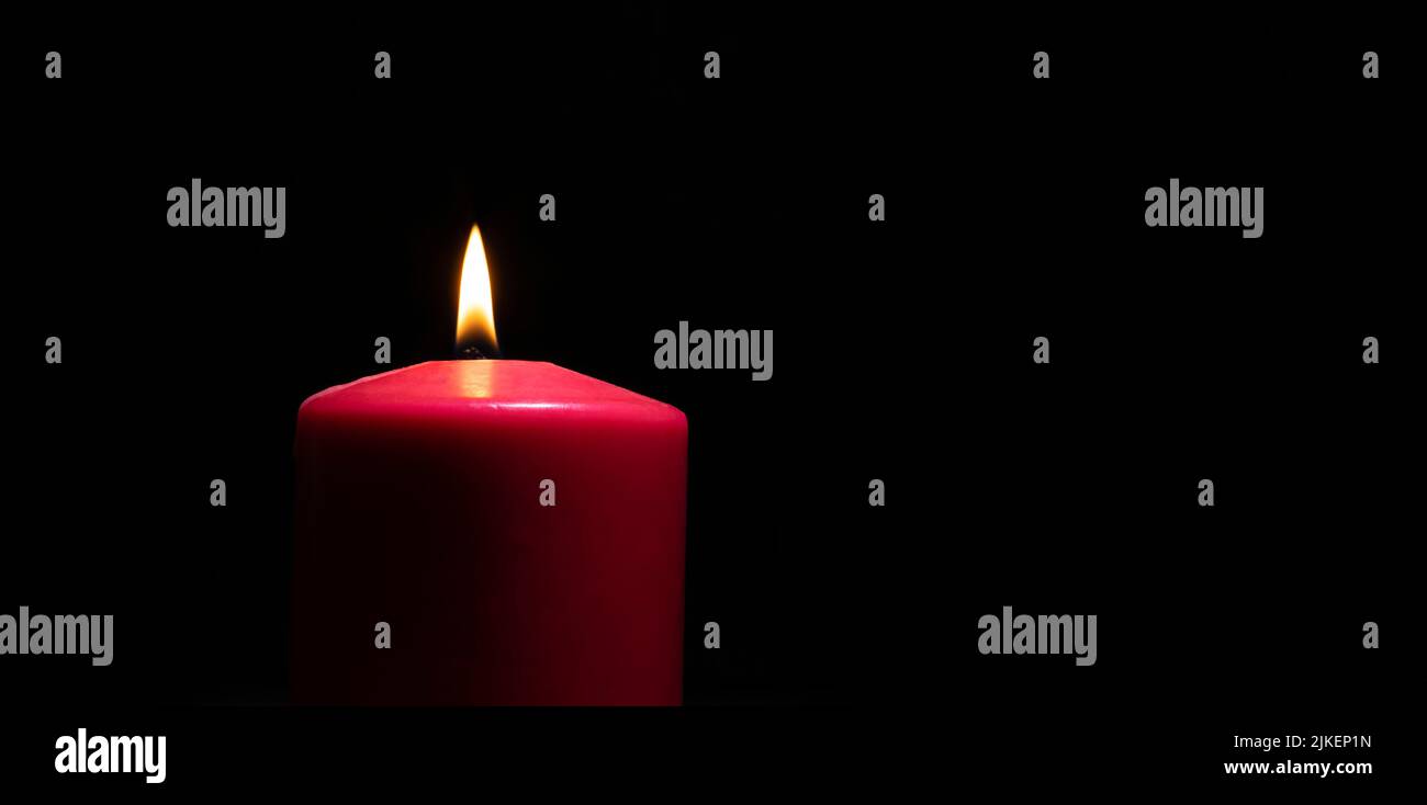 Red prayer candle melting hi-res stock photography and images - Alamy