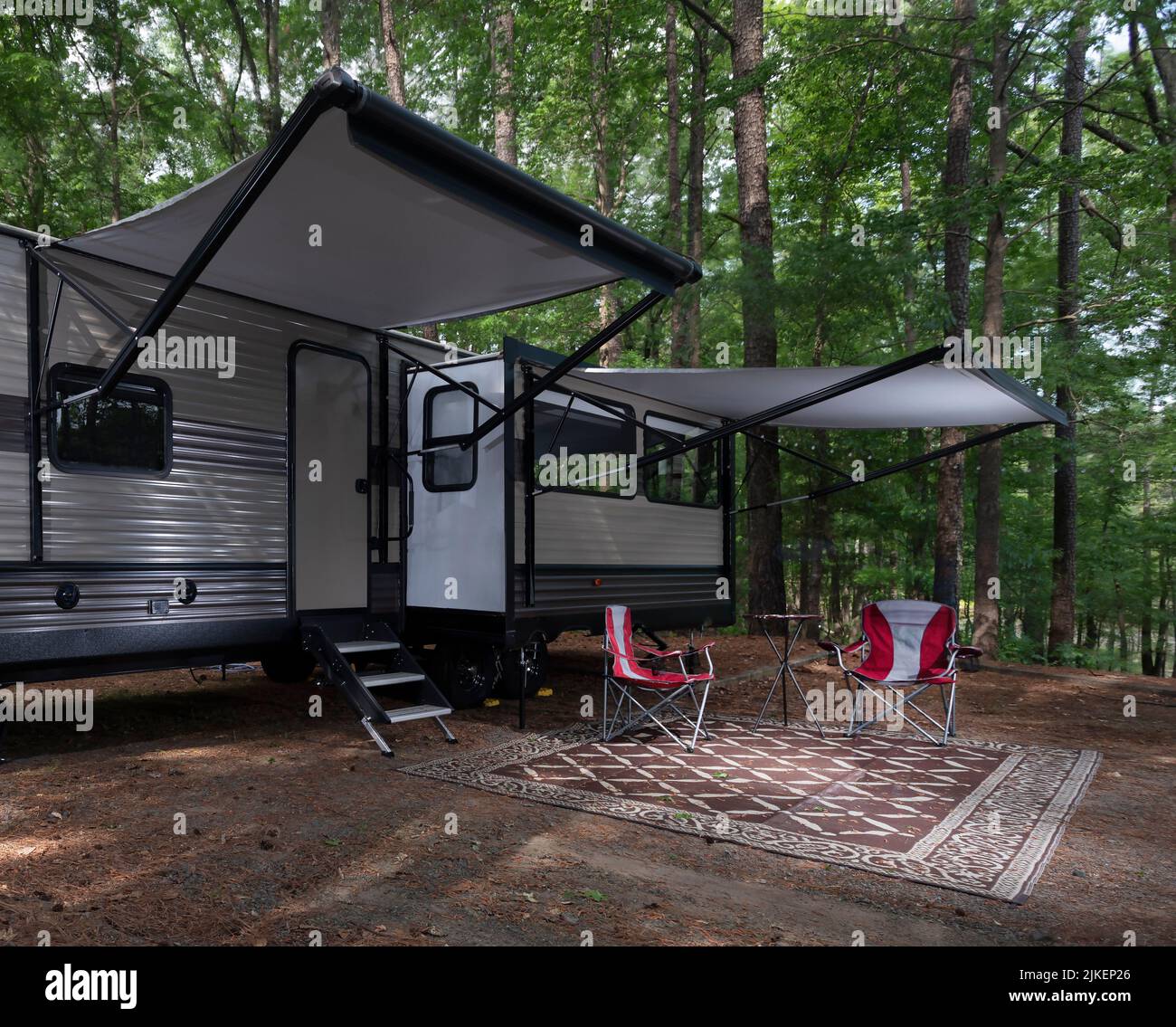 RV set up with awnings out at an evening campsite at Jordan Lake Stock ...