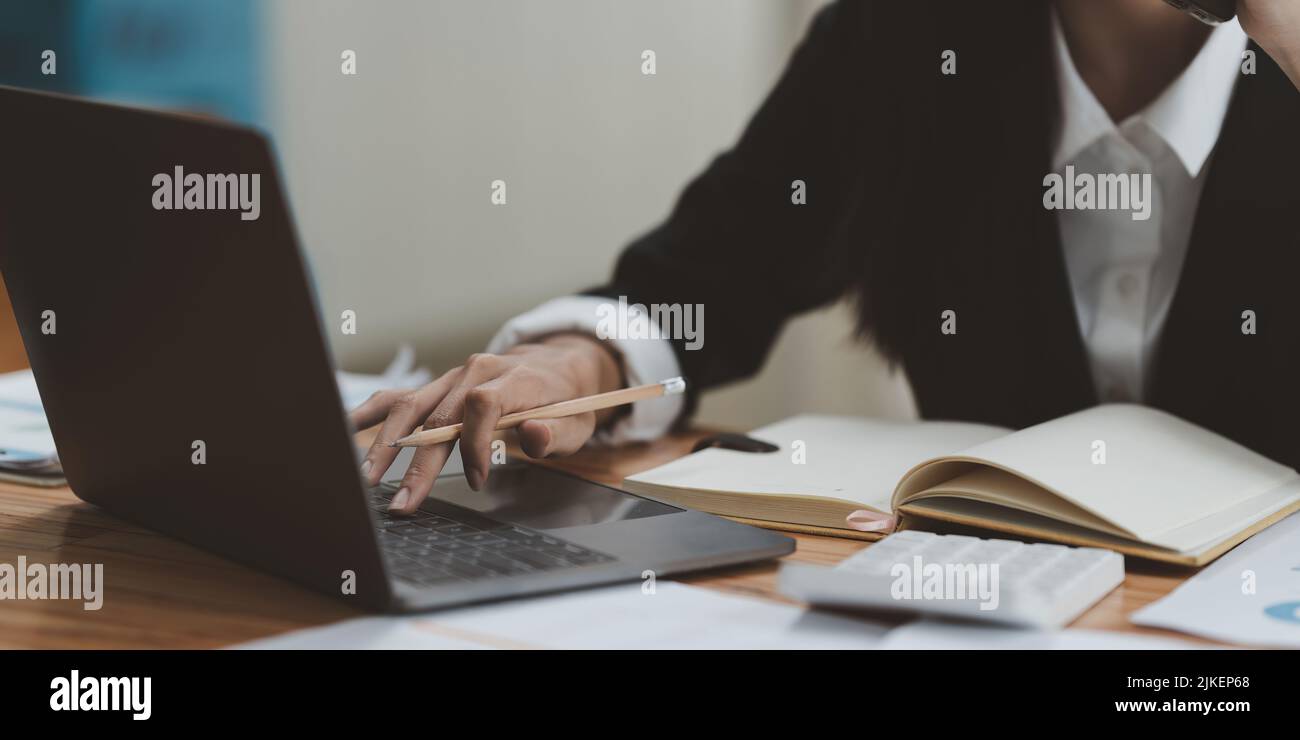 Business woman calculating companys hi-res stock photography and images ...