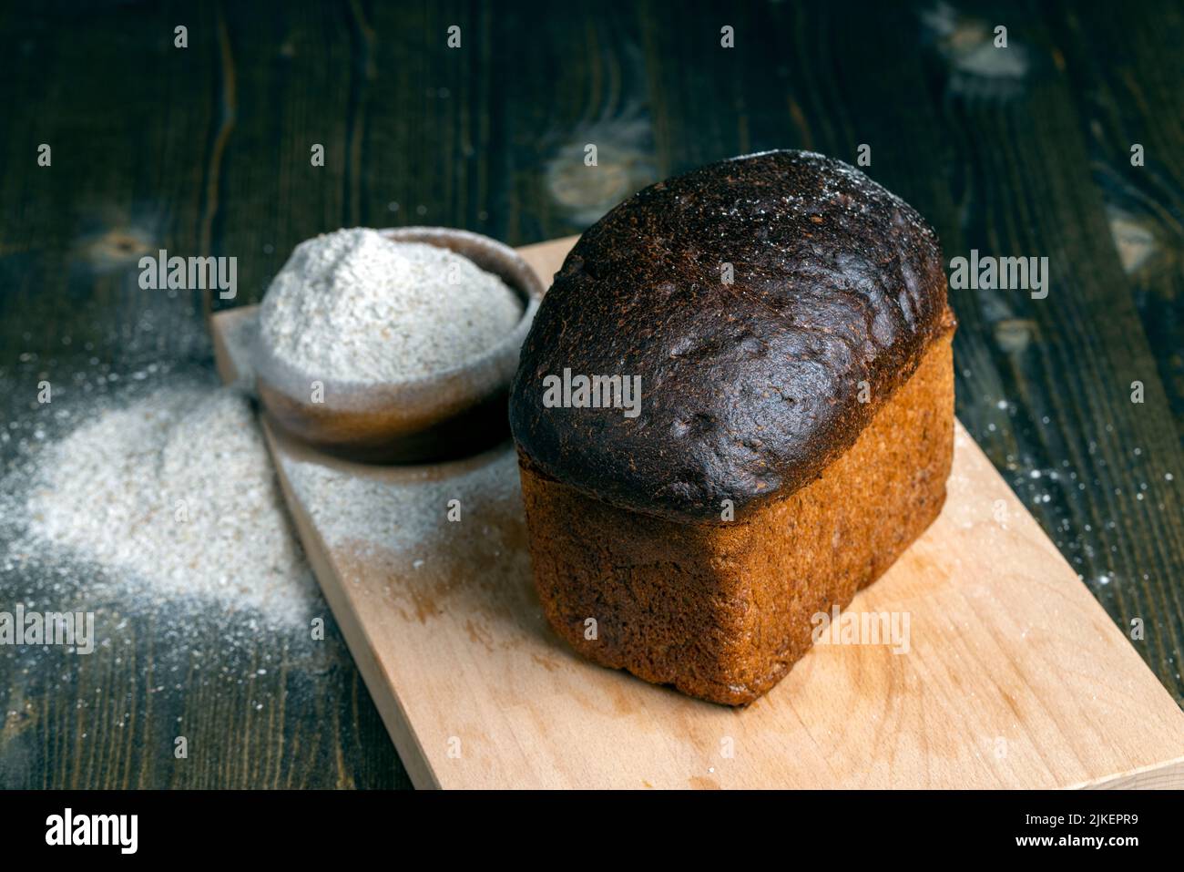 Rectangular loaf of rye flour bread, black sour bread made from rye ...