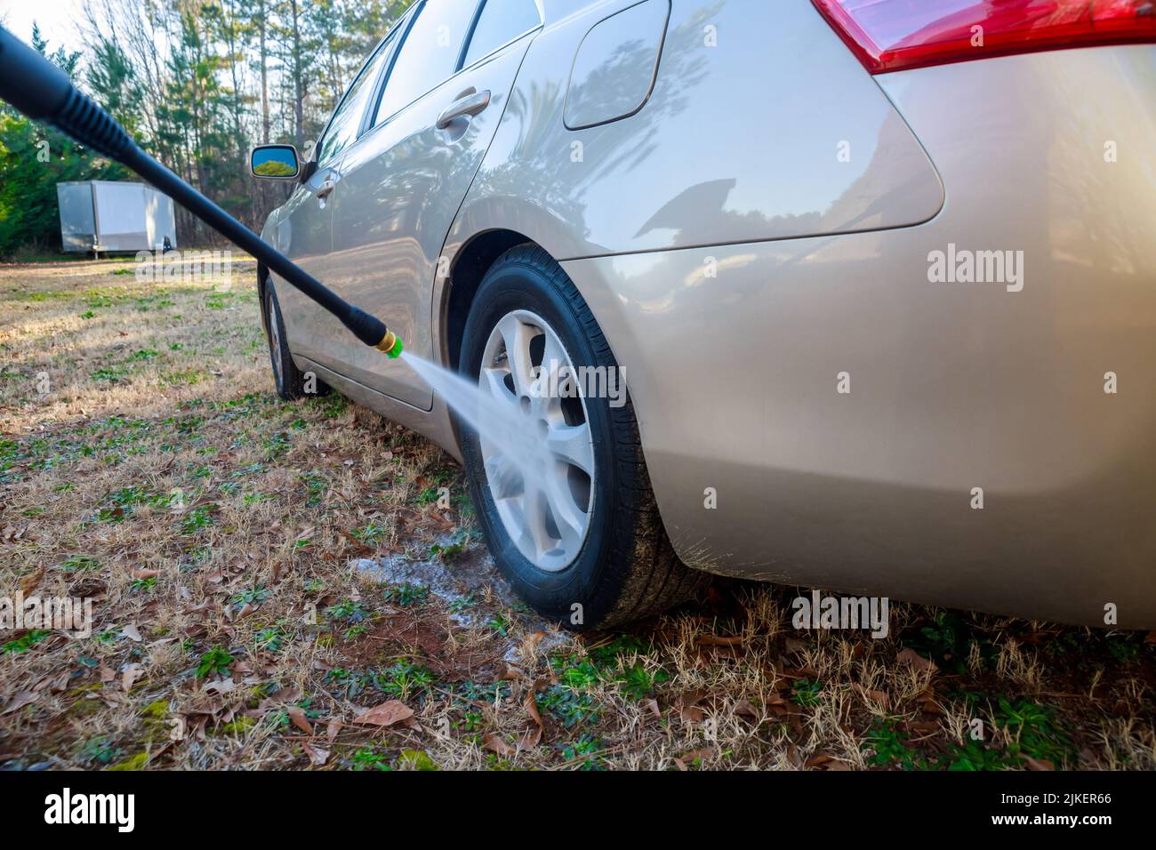 During wheel washing, a sprayer is used to wash the car Stock Photo - Alamy