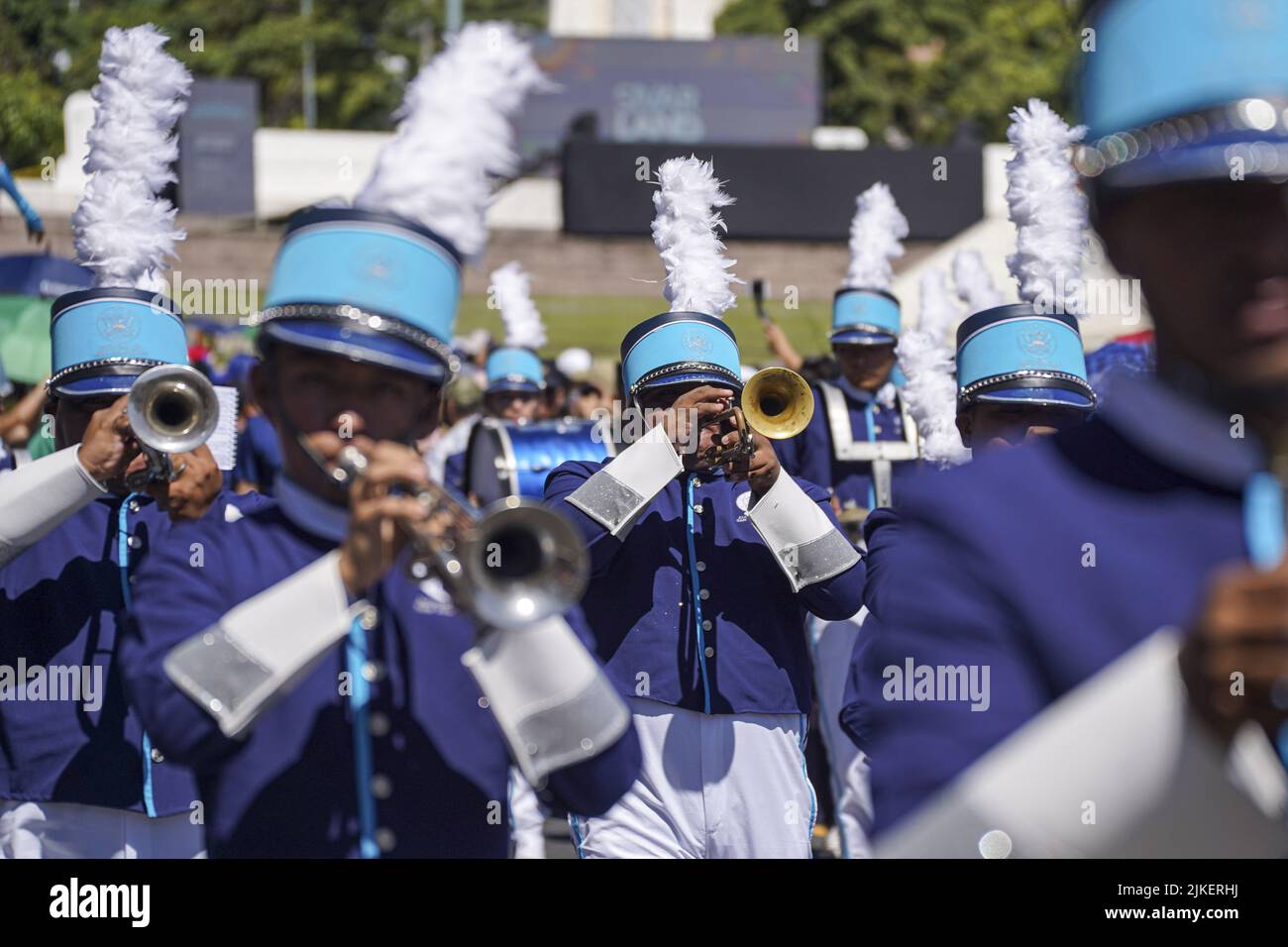 Members of a marching band march during a parade at the beginning of ...