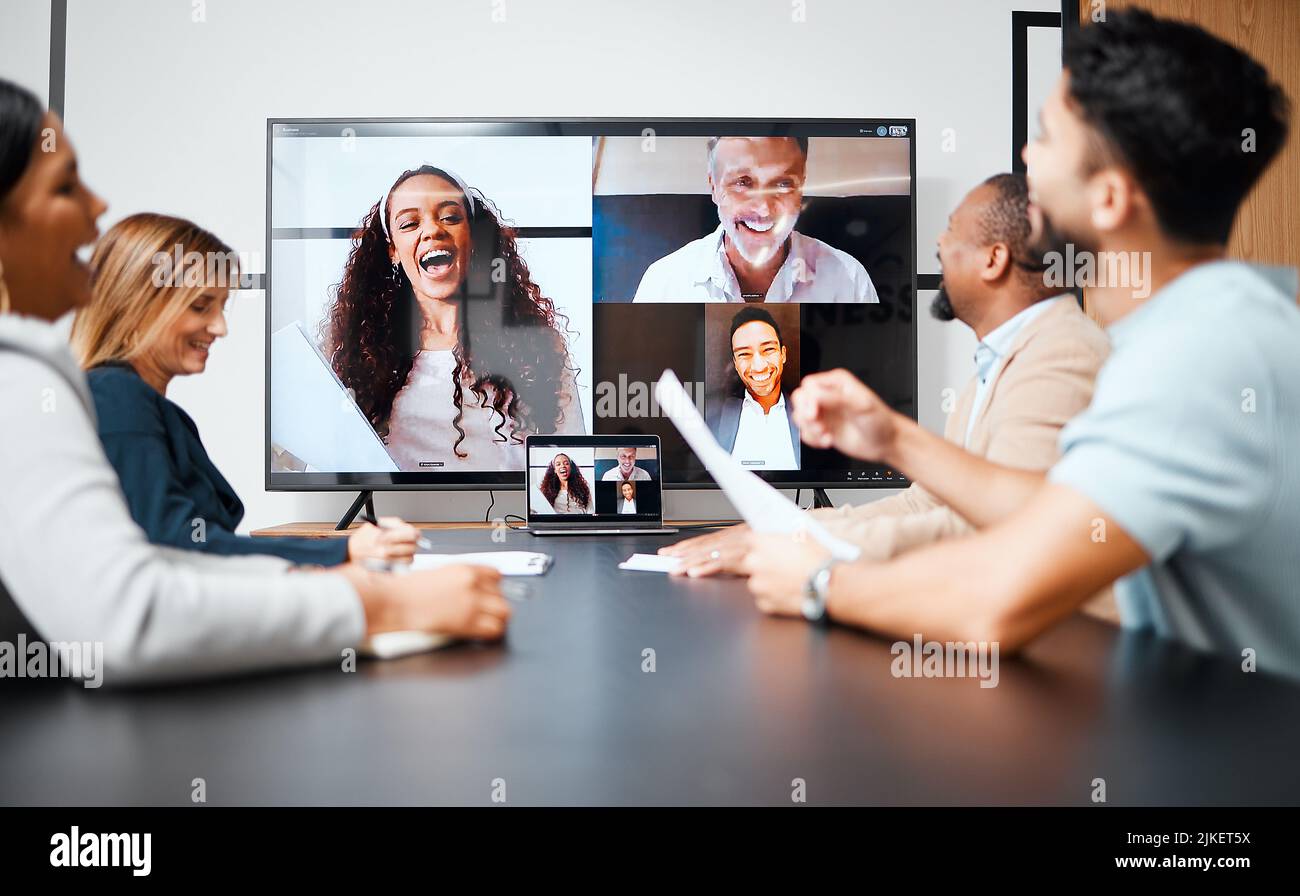 Staying connected with colleagues around the world. a diverse group of ...