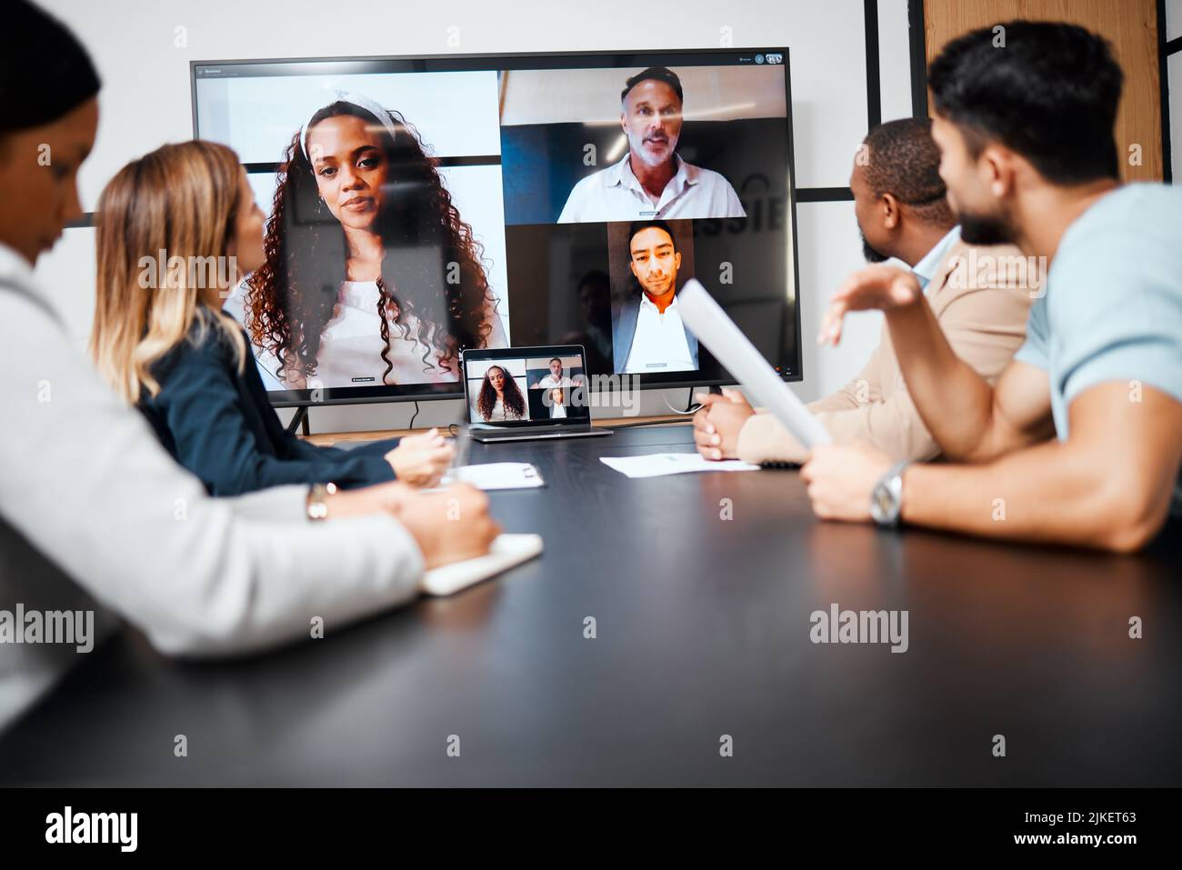 Connecting with colleagues around the globe. a diverse group of ...