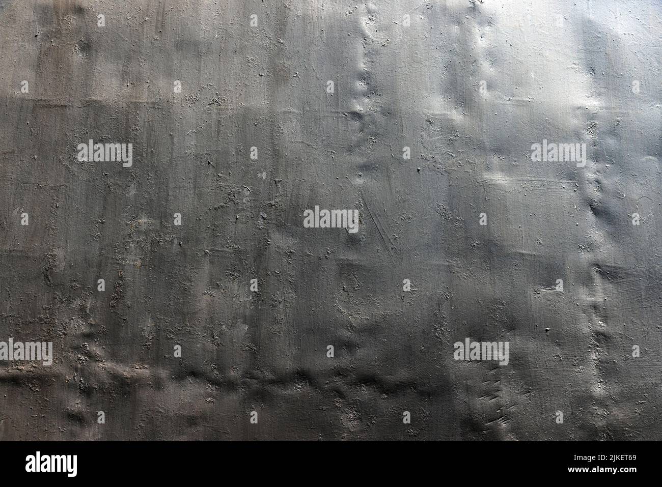 Part of the metal structure of an old steam locomotive, a sheet of ...