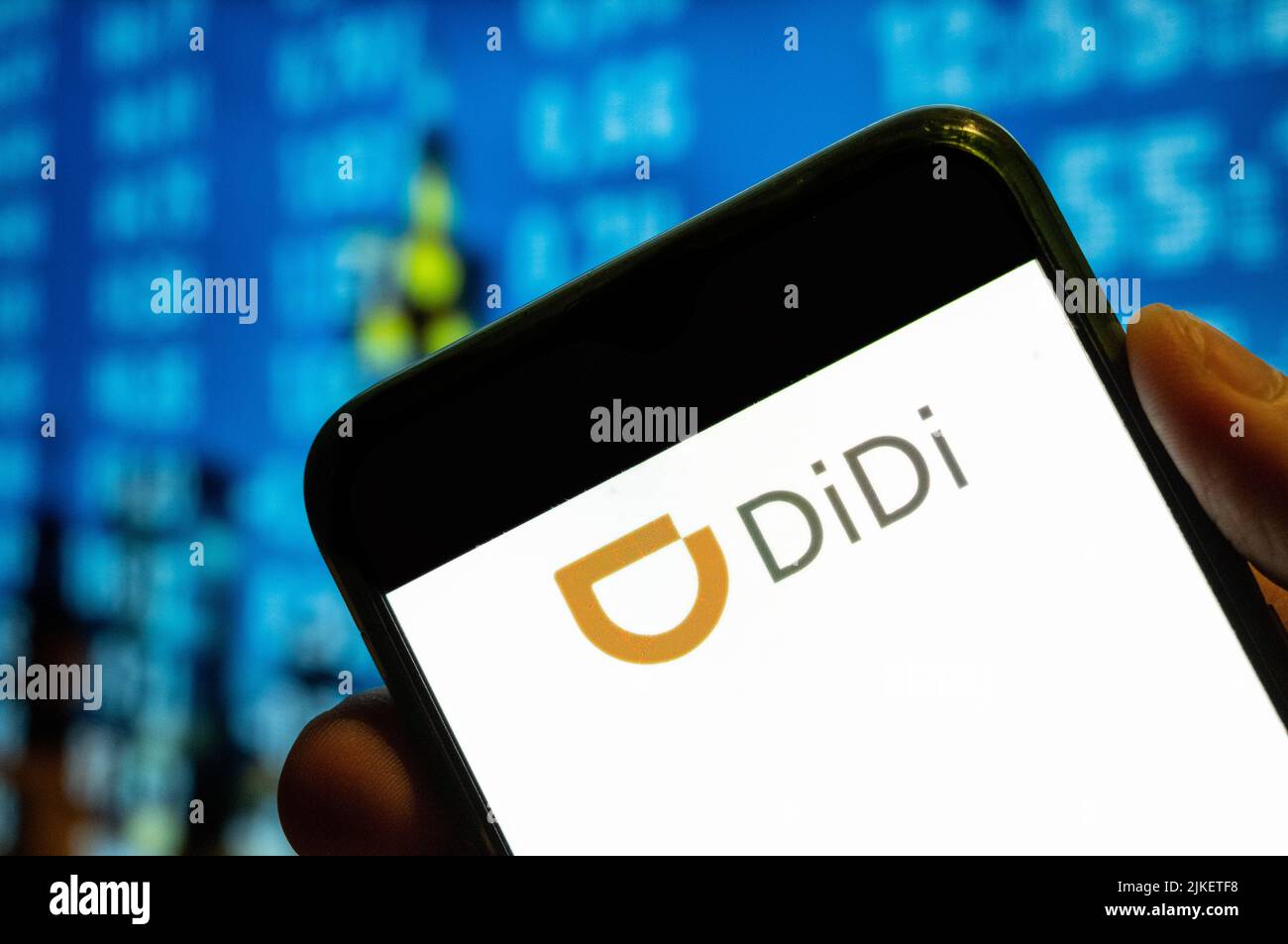 In this photo illustration, the Chinese ride-sharing company, Didi logo ...