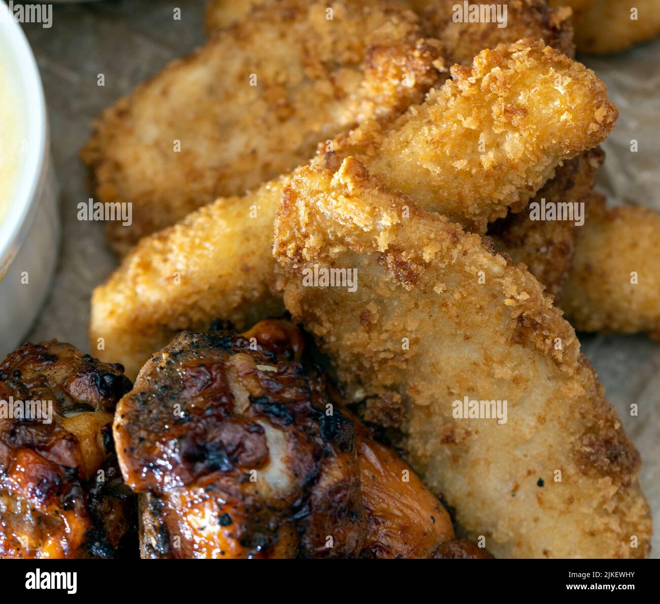 a set of different types of products fried together, French fries ...