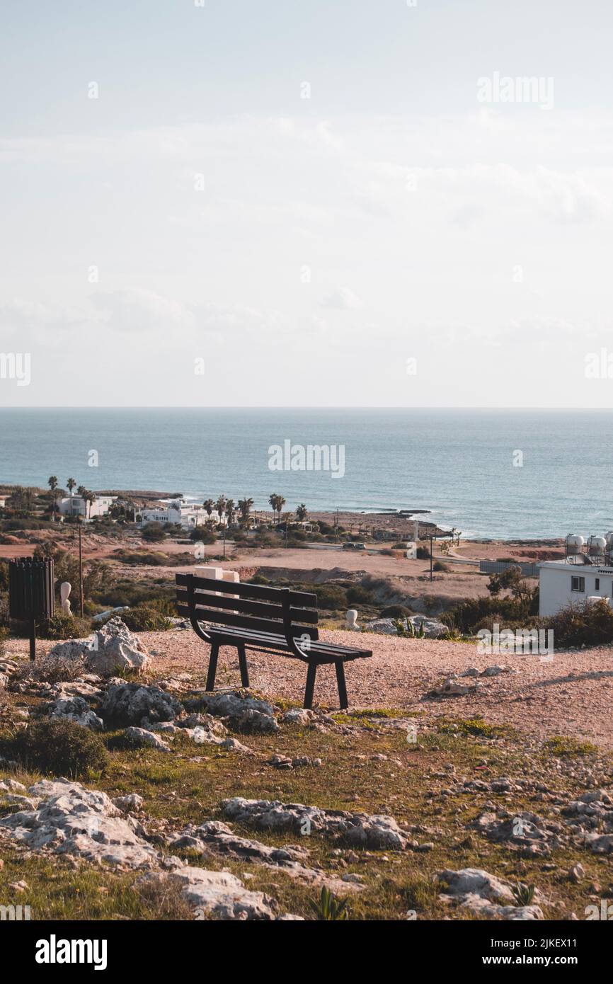 Wooden bench with sea background in Ayia Napa, Cyprus Stock Photo - Alamy