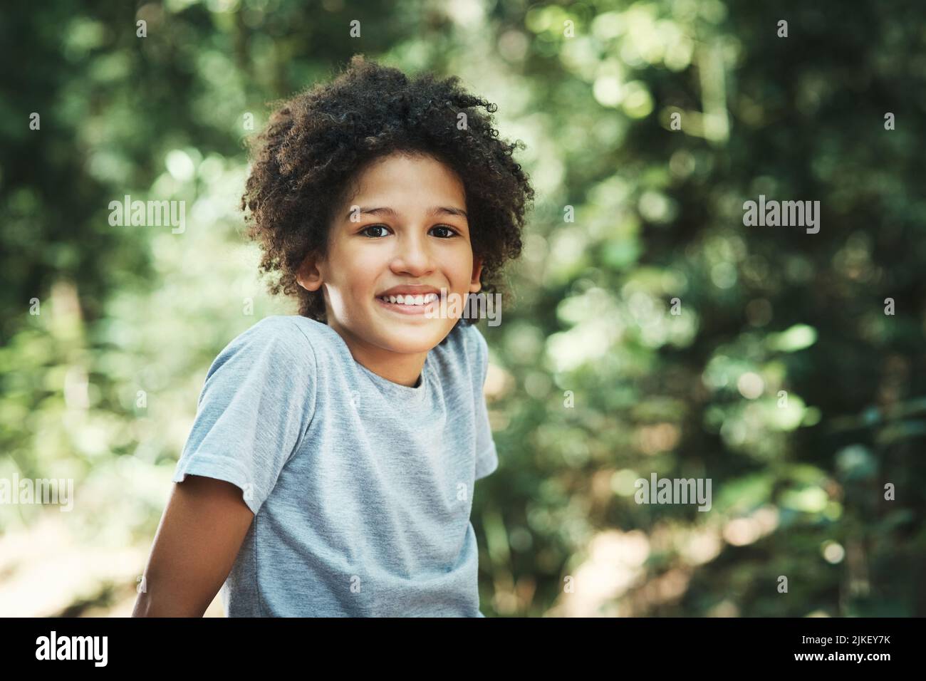 Why be bored when you can be in nature. a teenage boy having fun in ...