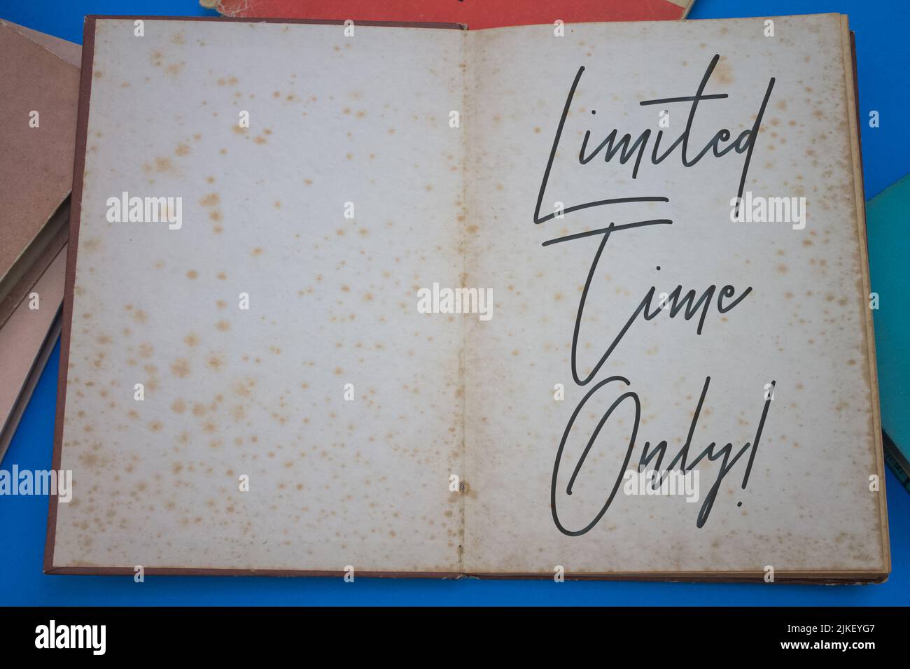 Limited Time Only word in opened book with vintage, natural patterns ...