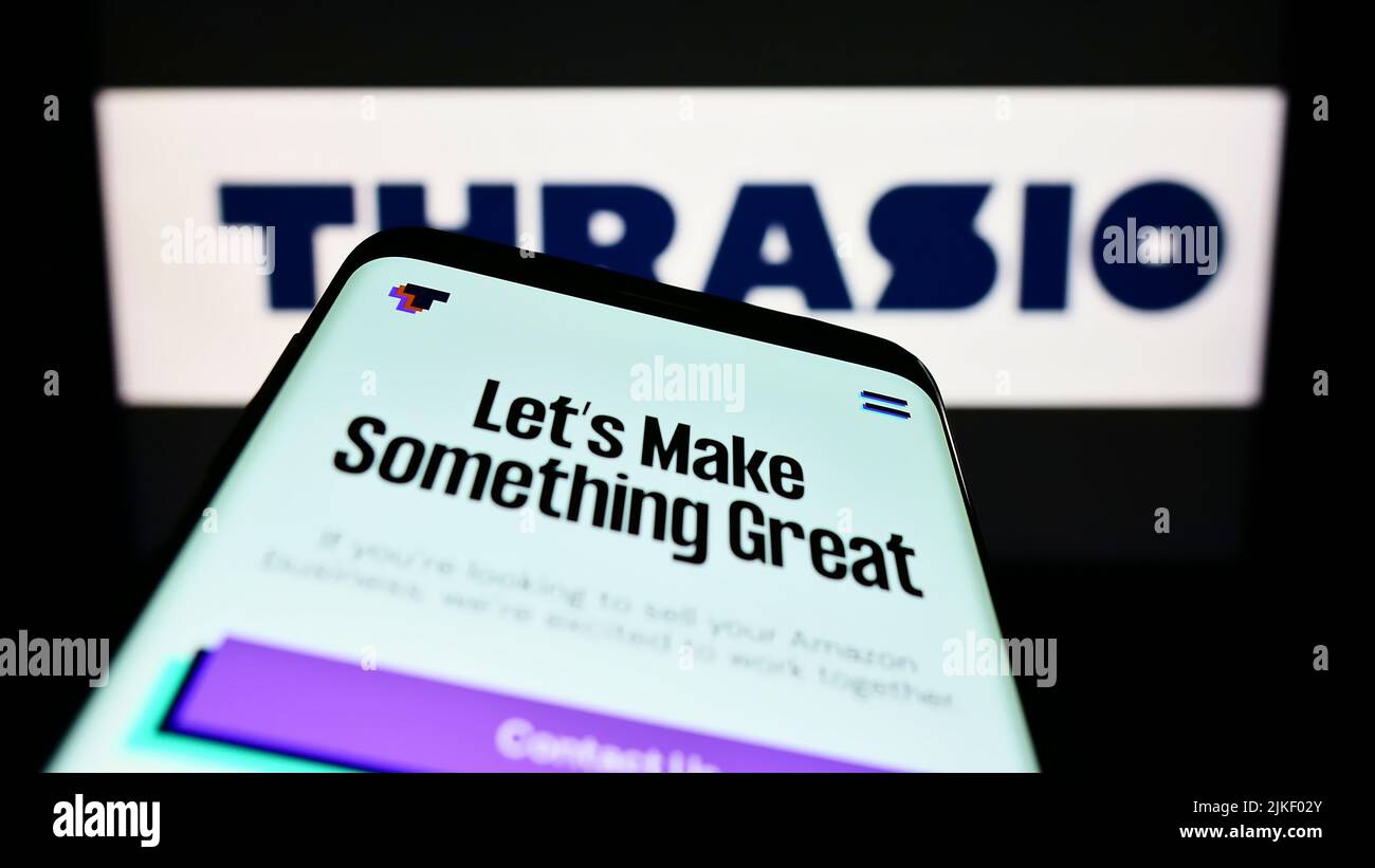 Smartphone with website of US retail company Thrasio LLC on screen in ...
