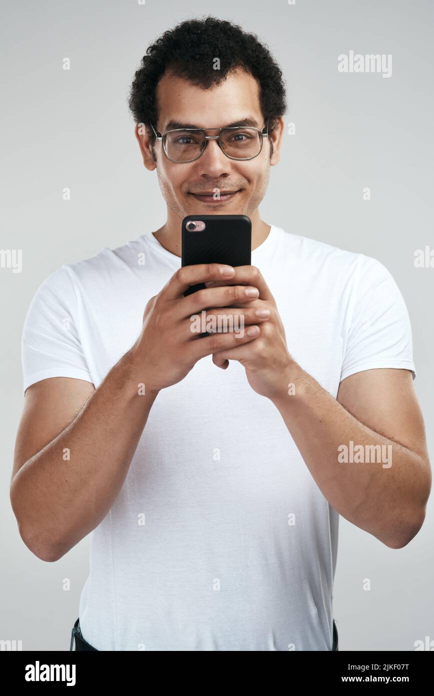 This app will make me tons of money. a handsome young man using his ...