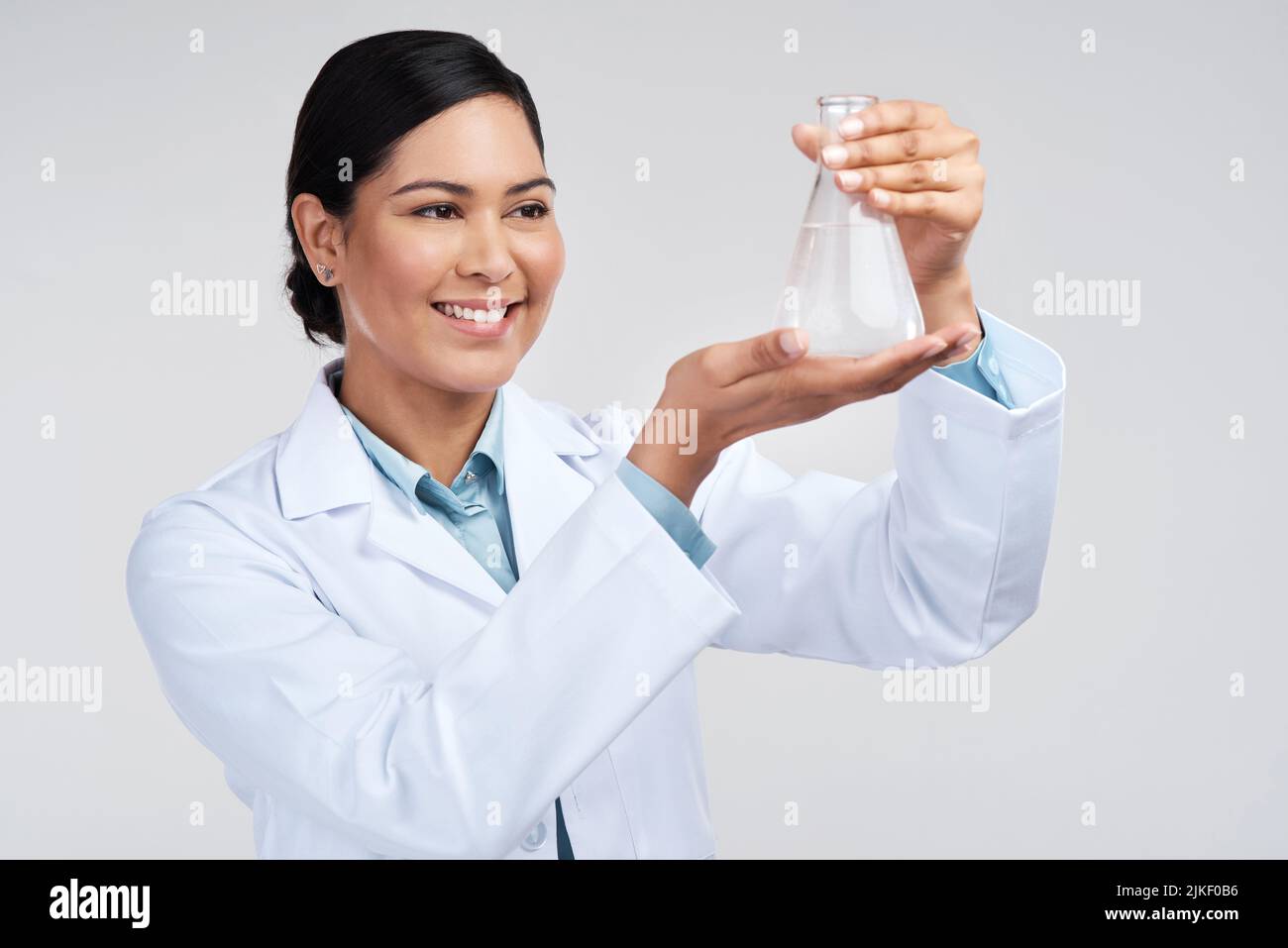 Experiments are just what she does. an attractive young female ...