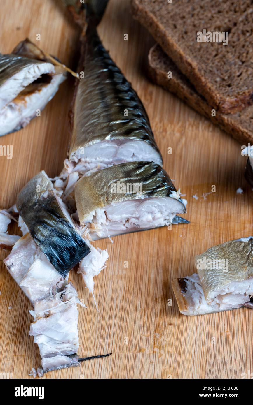 cut into pieces of smoked mackerel during cooking , smoked mackerel ...