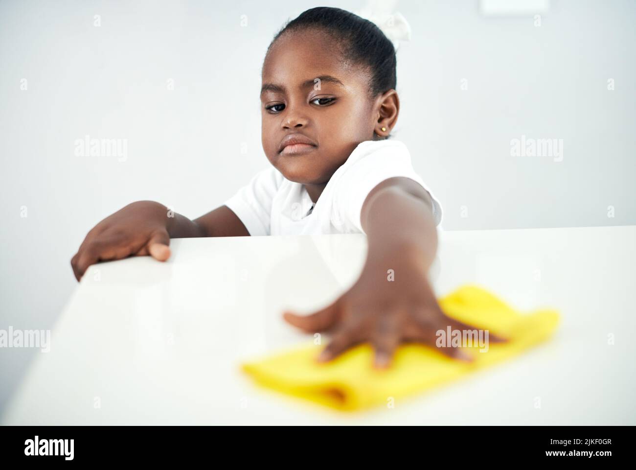 I like to help out in the kitchen. an adorable little girl helping out ...