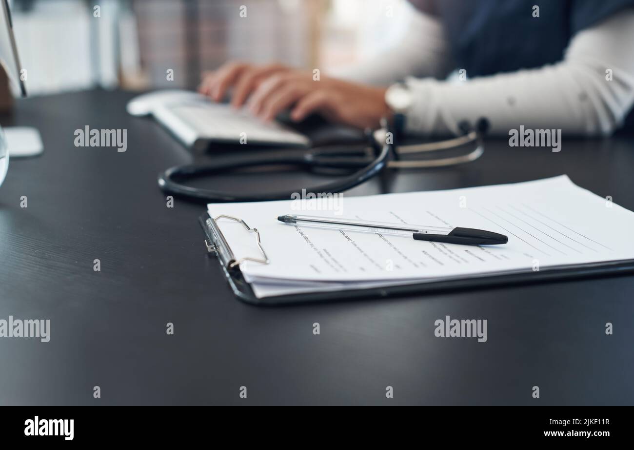 Unrecognizable female doctor typing hi-res stock photography and images ...