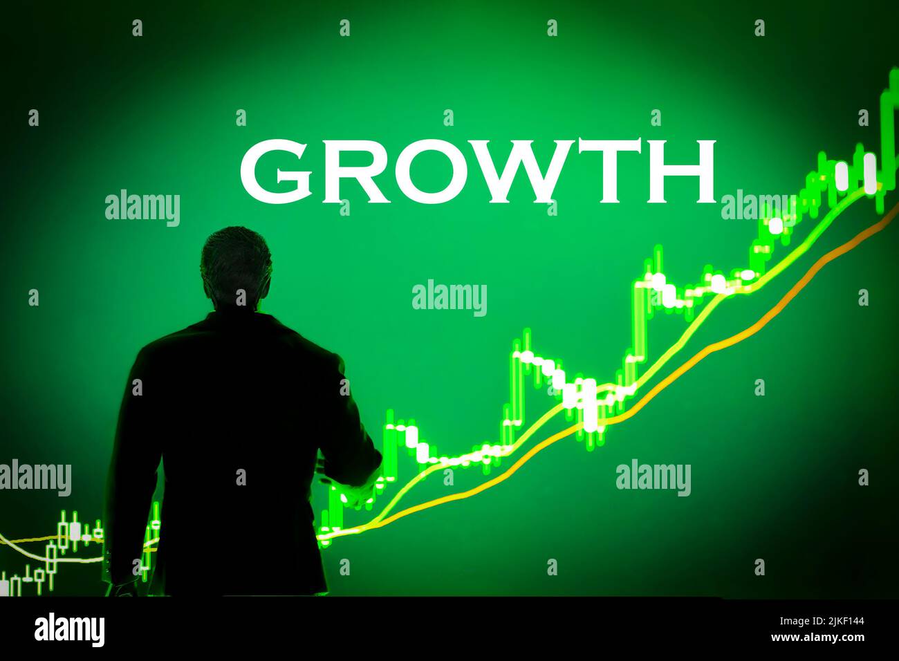 GROWTH word with the background of a businessman looking at the ...