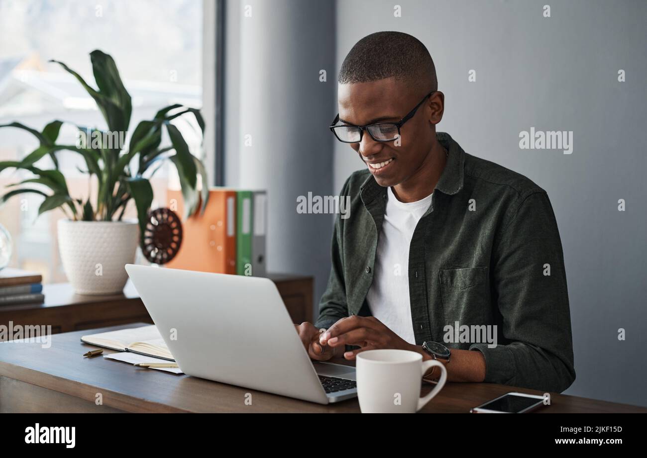This email is important for my business. a young businessman typing on ...