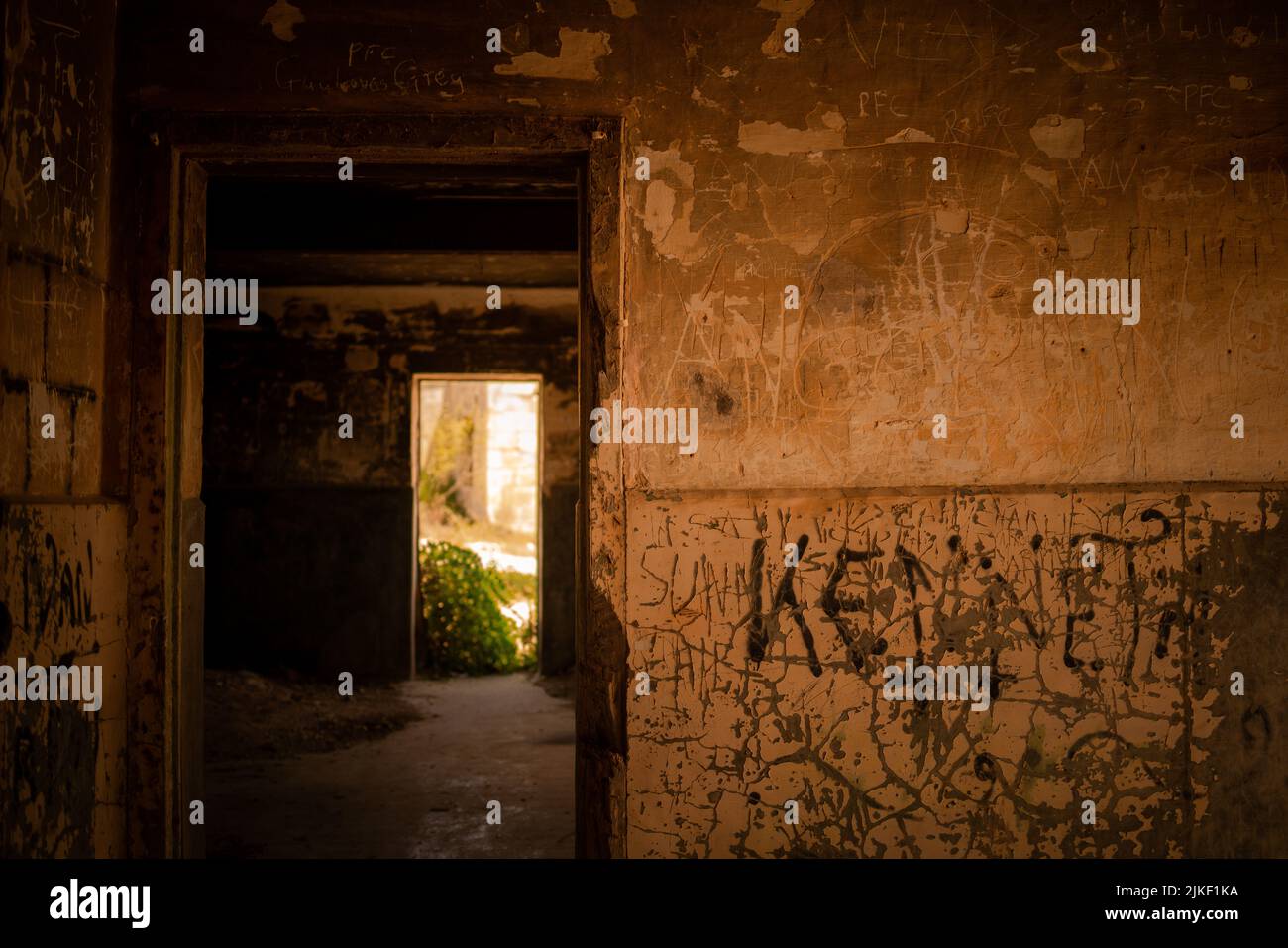 run down abandoned derelict building with scratch marks on walls Stock ...