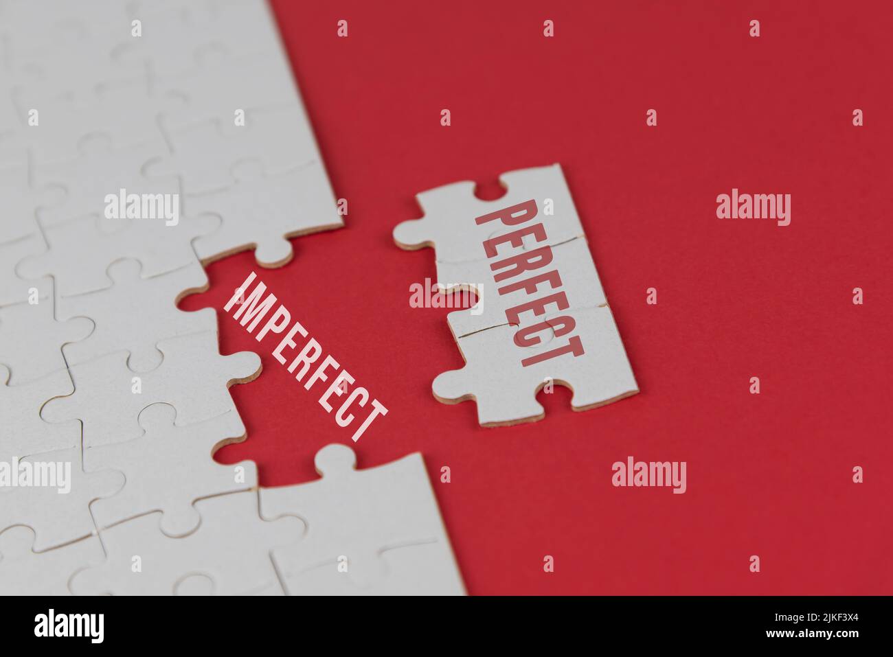 From imperfect to be perfect concept. With white jigsaw puzzle piece ...