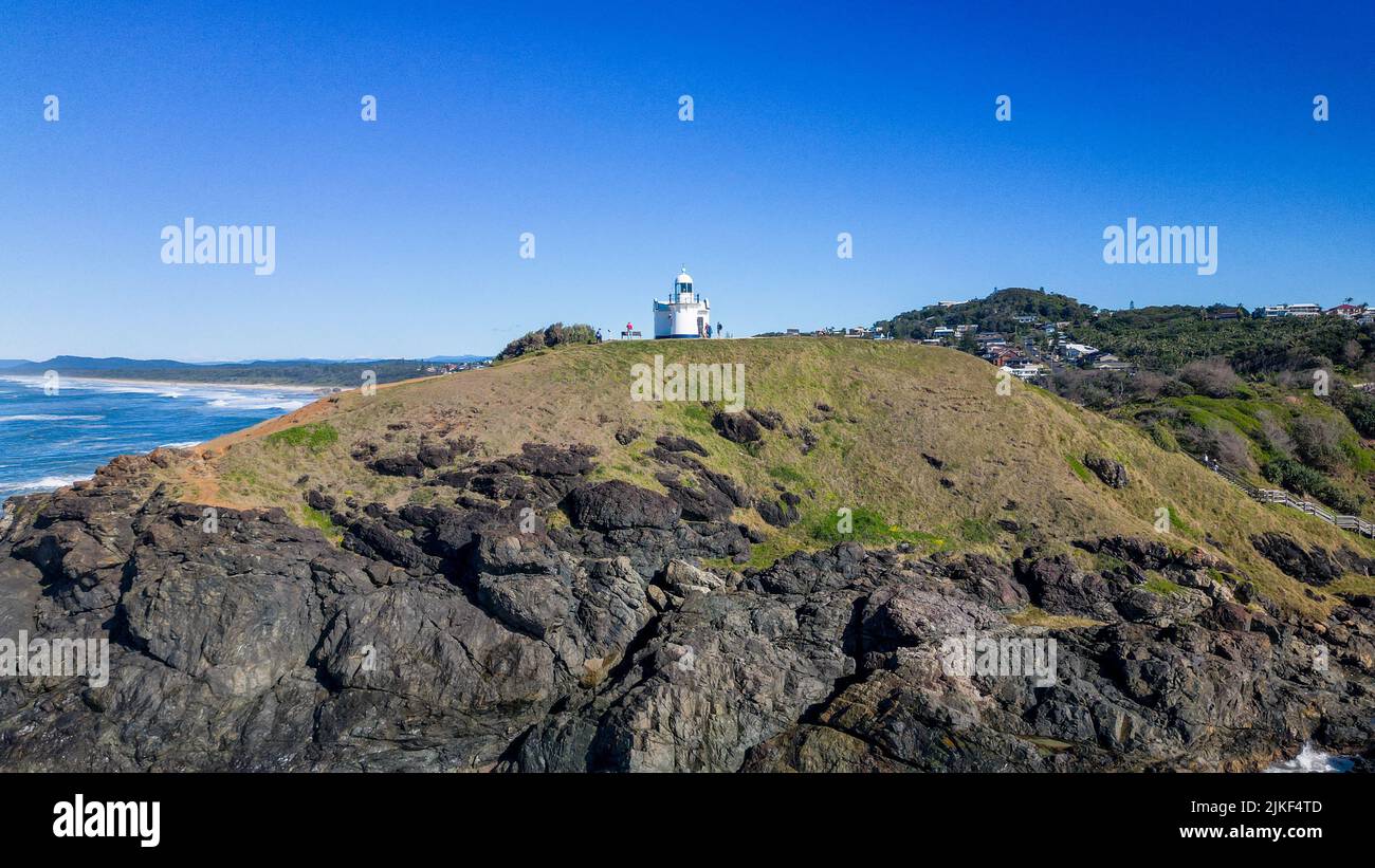 The Tacking Point Lighthouse on a rocky cliff in Port Macquarie, New ...