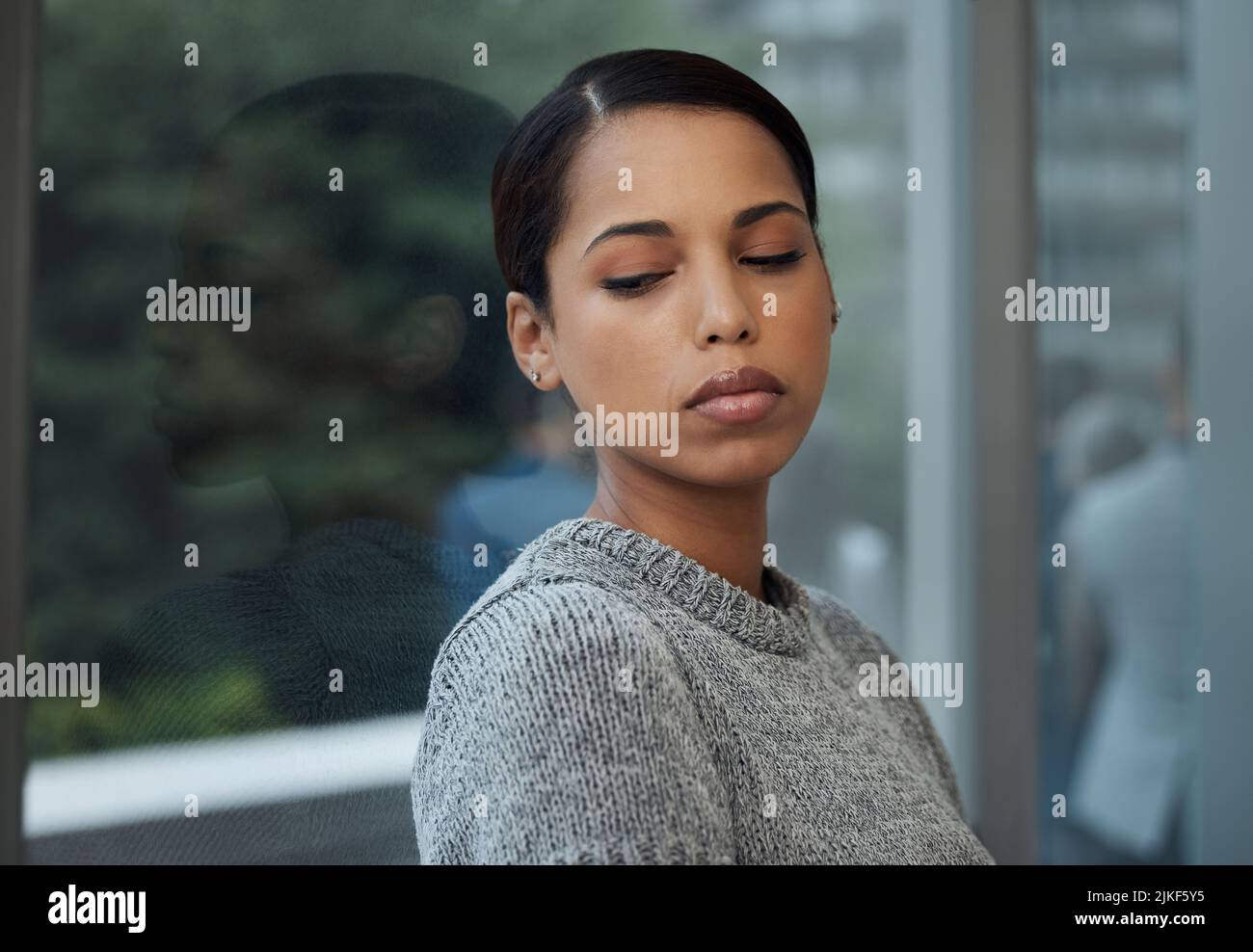 Dreaming about white beaches. a young businesswoman taking a break and ...
