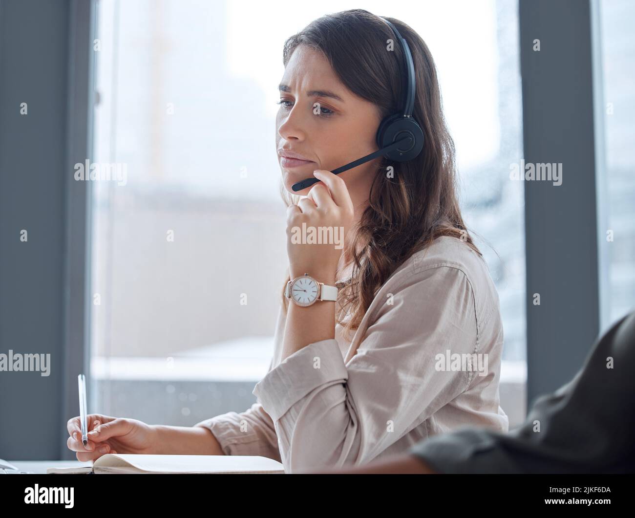 Serious call center operator hi-res stock photography and images - Alamy