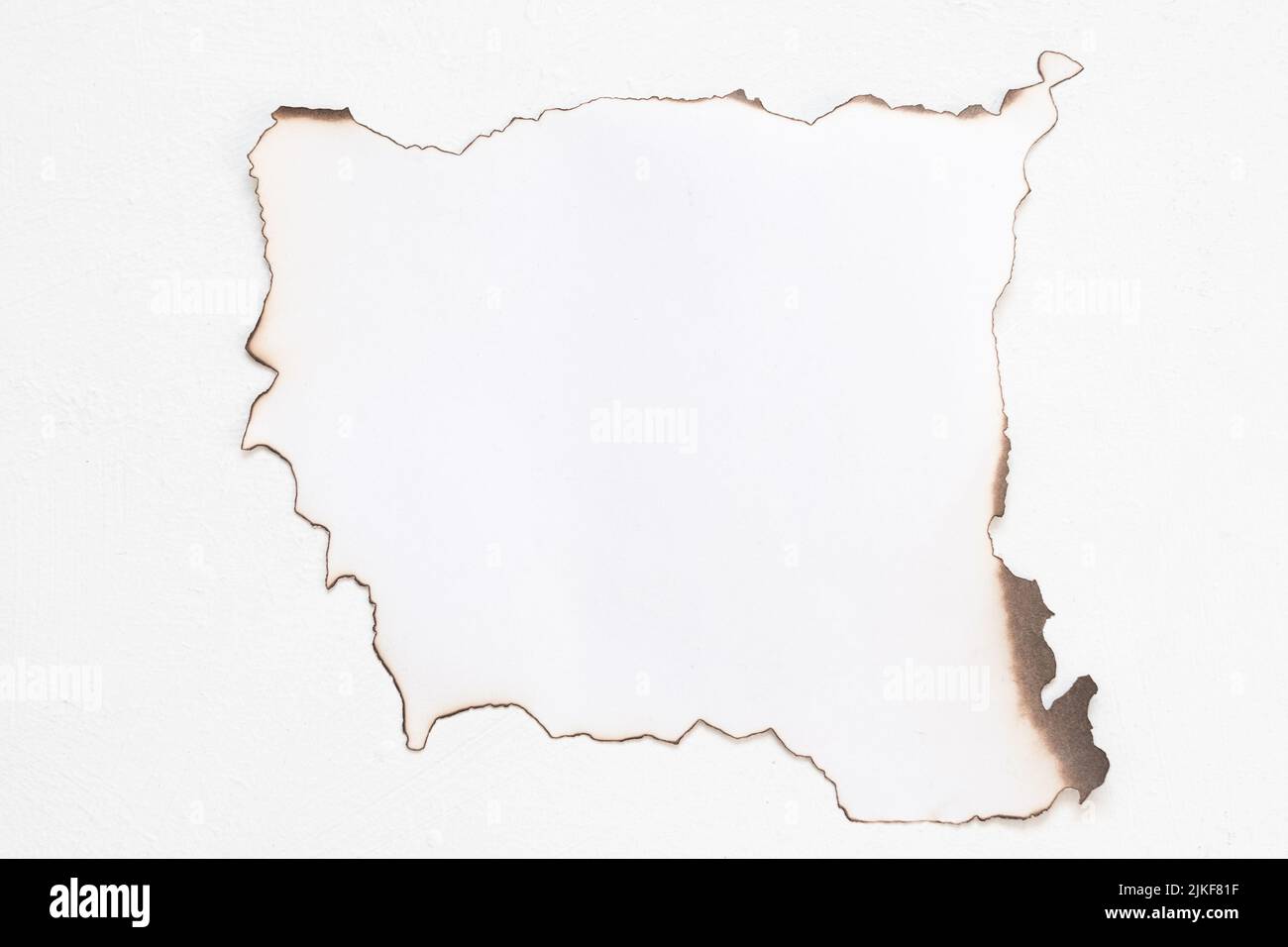 burnt paper mockup white abstract background Stock Photo - Alamy