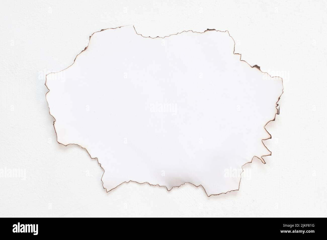 burnt paper mockup white abstract background Stock Photo - Alamy