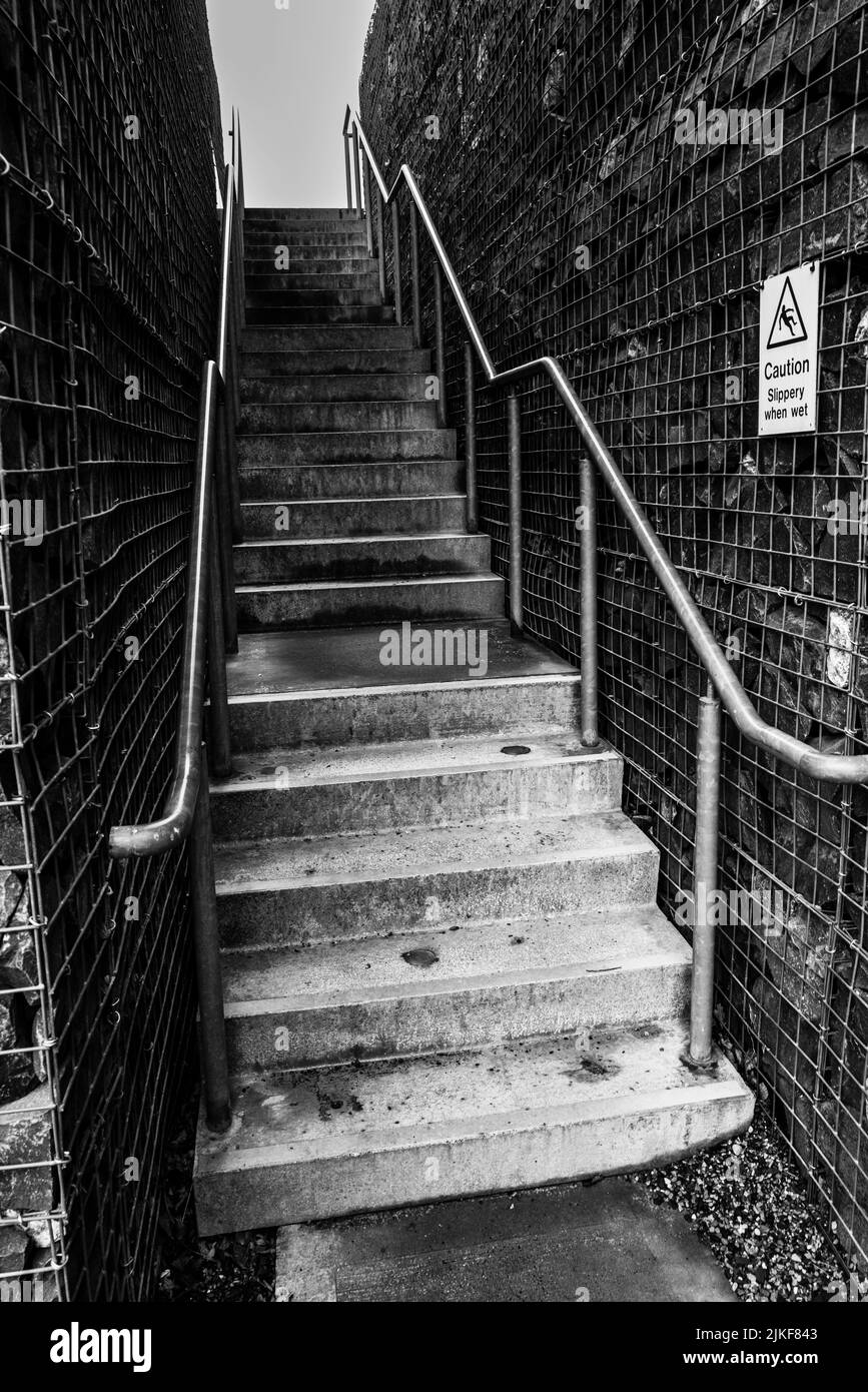 Concrete stairs leading out of pit yard Stock Photo - Alamy