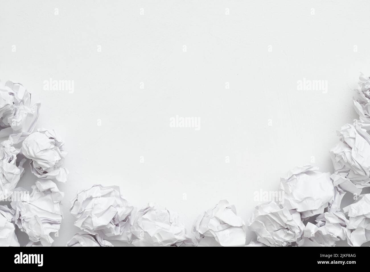 creative block paper ball pile white background Stock Photo - Alamy